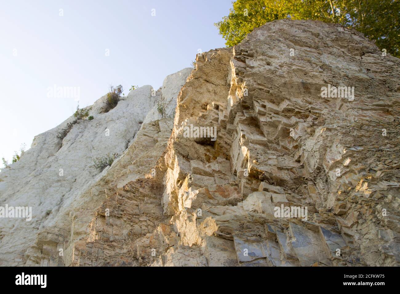 Cliff of rock mountain, Cracks and layers of sandstone. Stone textures ...