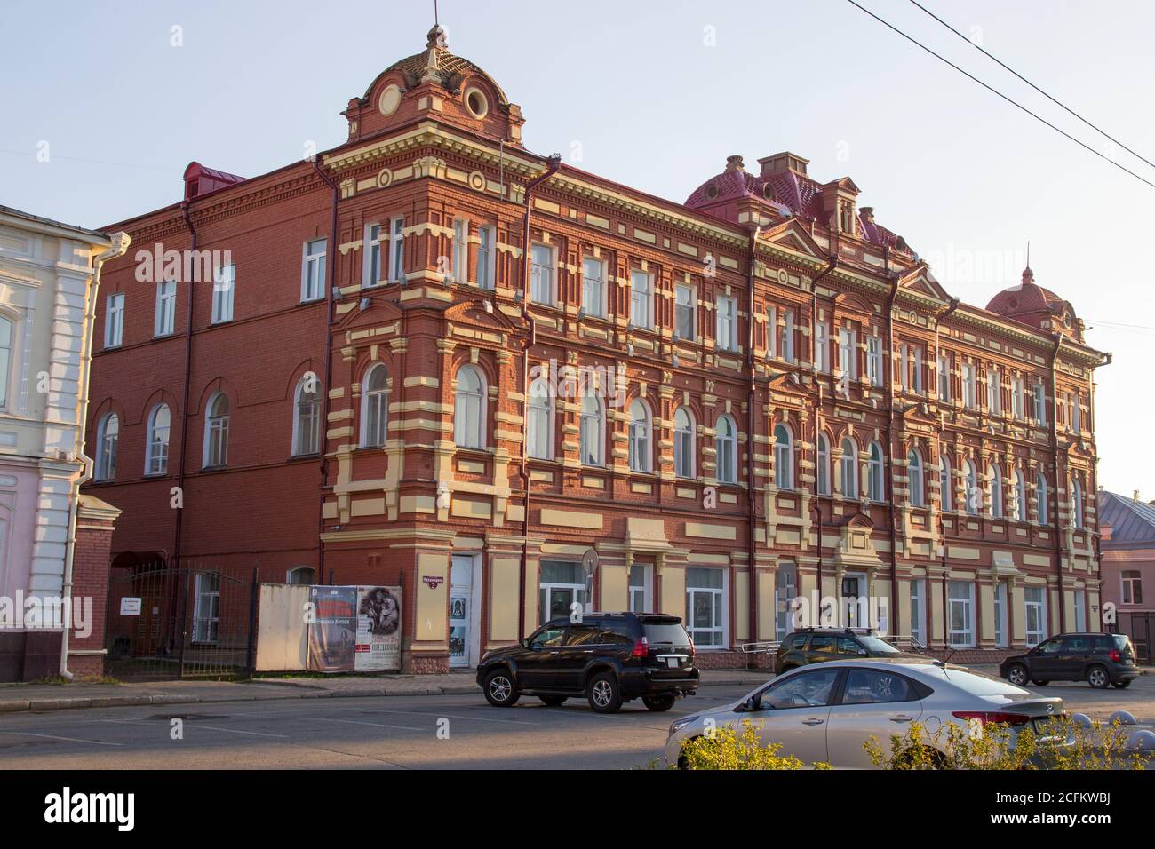 Old brick building in the Siberian city of Tomsk. The main street of ...