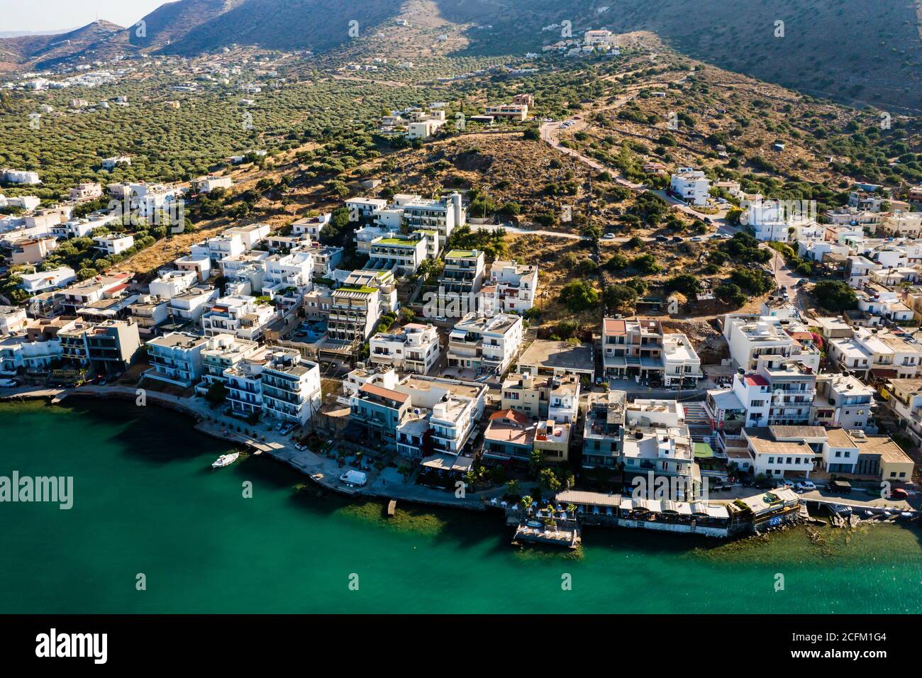ELOUNDA, CRETE, GREECE - 27 AUGUST 2020: Aerial view of the seafront in ...