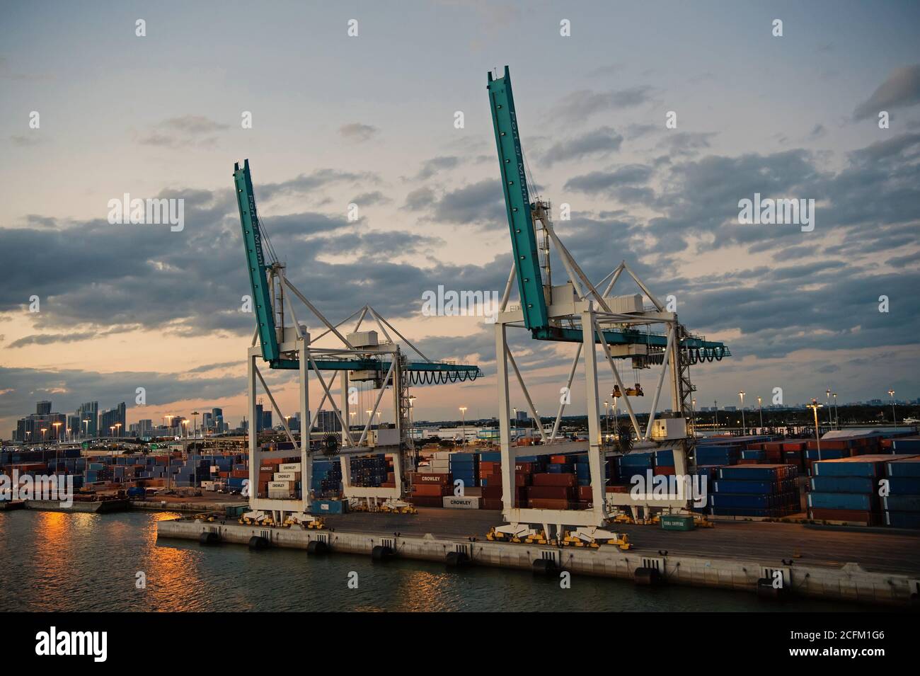 Miami, USA - March 01, 2016: cargo cranes on cloudy sky. Containers in ...