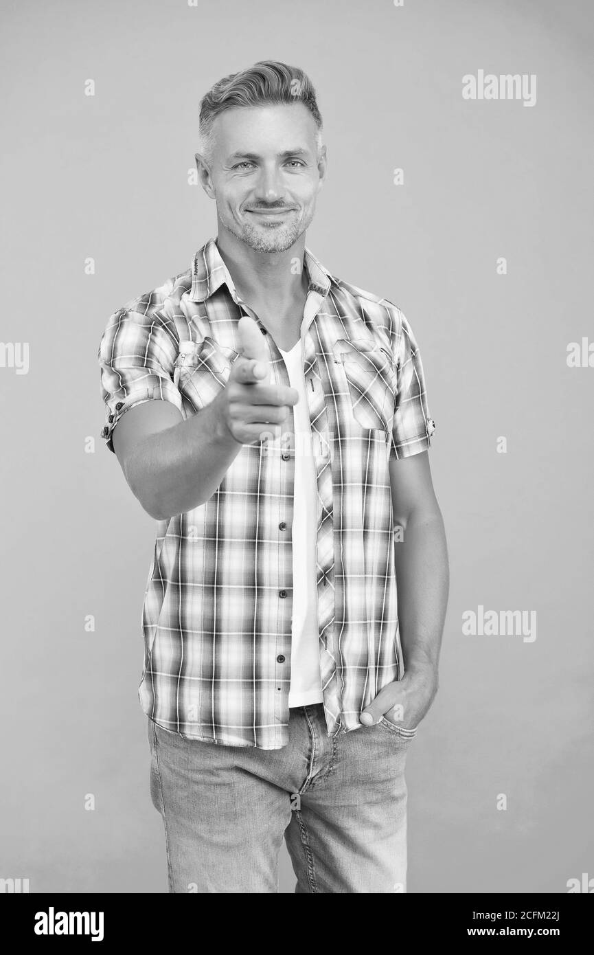 Hello you. Happy guy pointing straight blue background. Ad man ...