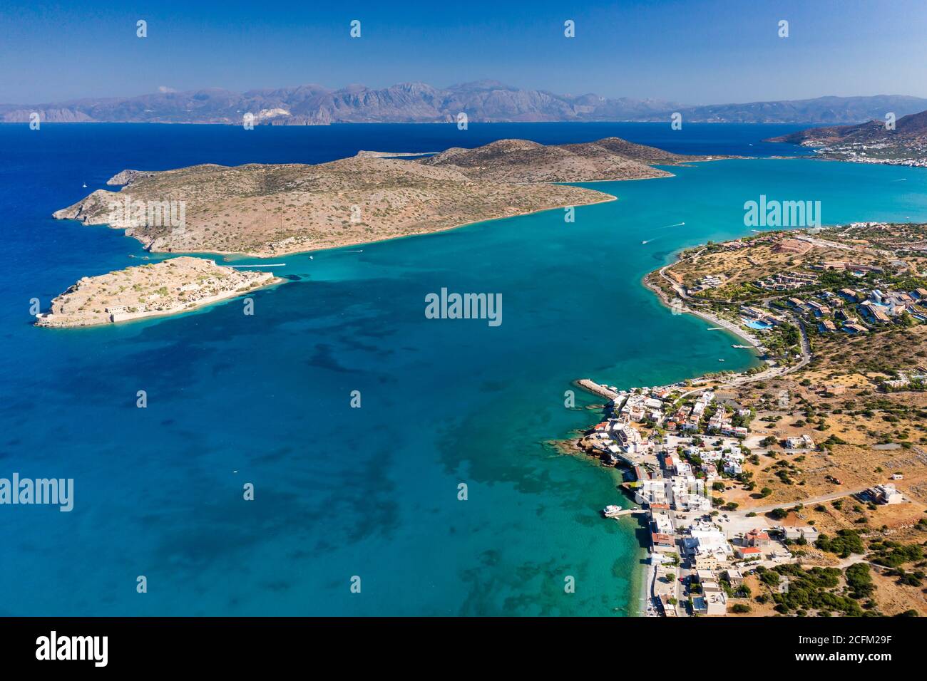 Aerial view of the medieval fortress of Spinalonga island and town of ...
