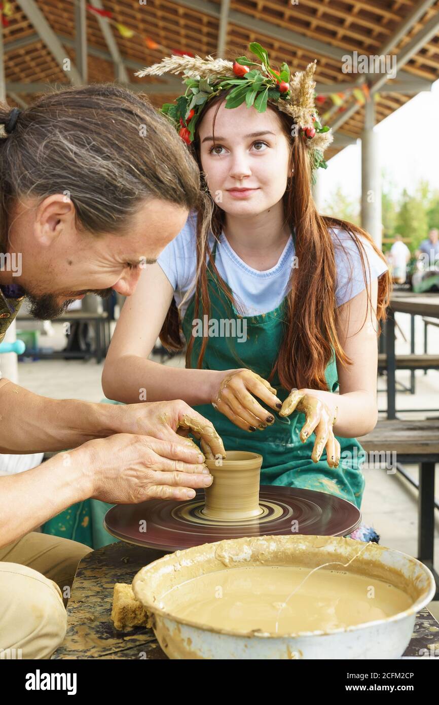 Moldavanskoye, Krymsk, Russia-05 October 2019: a Master teaches a girl ...