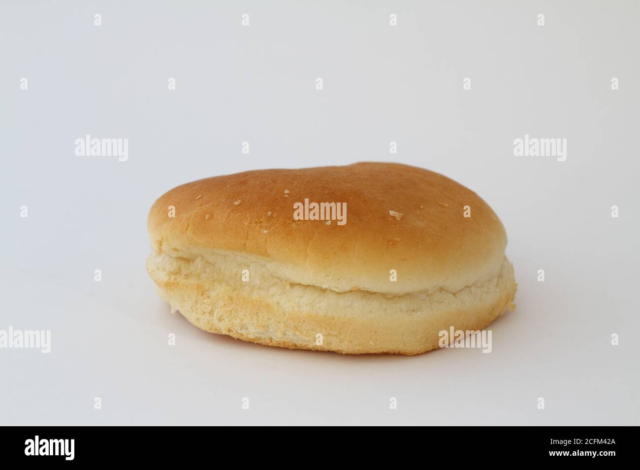 Yellow burger bread isolated on white background Stock Photo - Alamy
