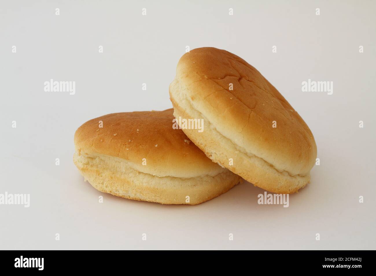 Yellow burger breads isolated on white background Stock Photo - Alamy
