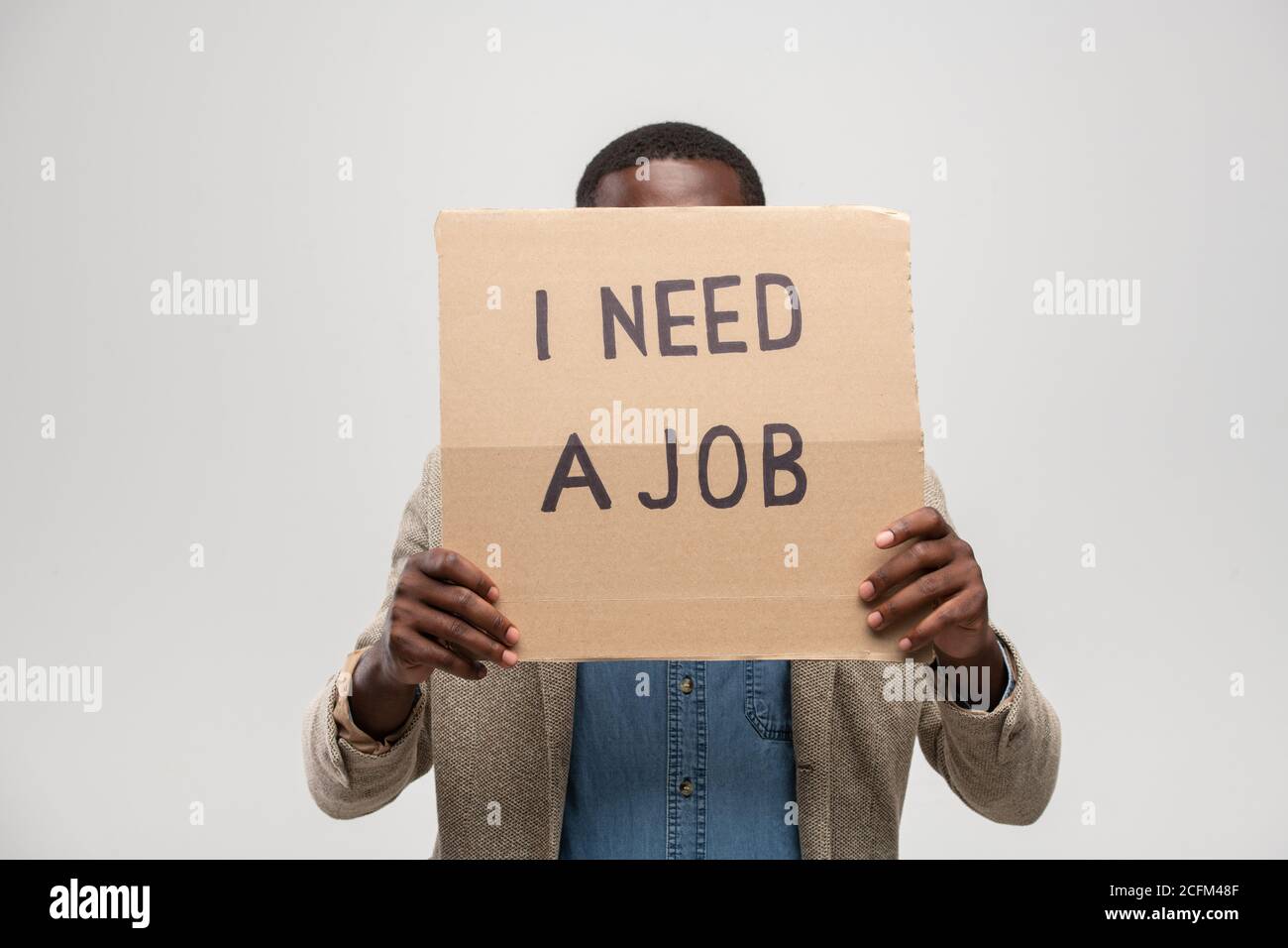 Cardboard sign man hi-res stock photography and images - Alamy