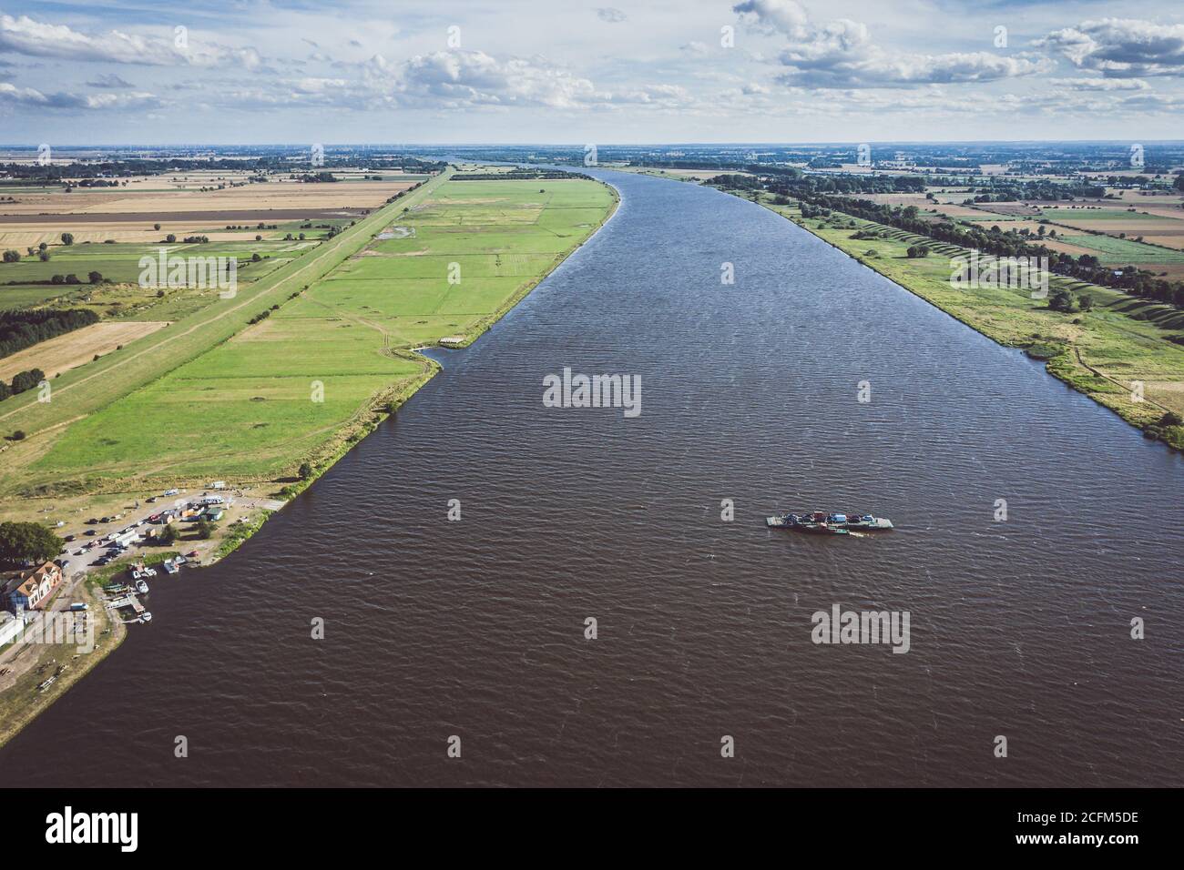 Aerial view of the ferry on the Vistula river near its mouth to the ...
