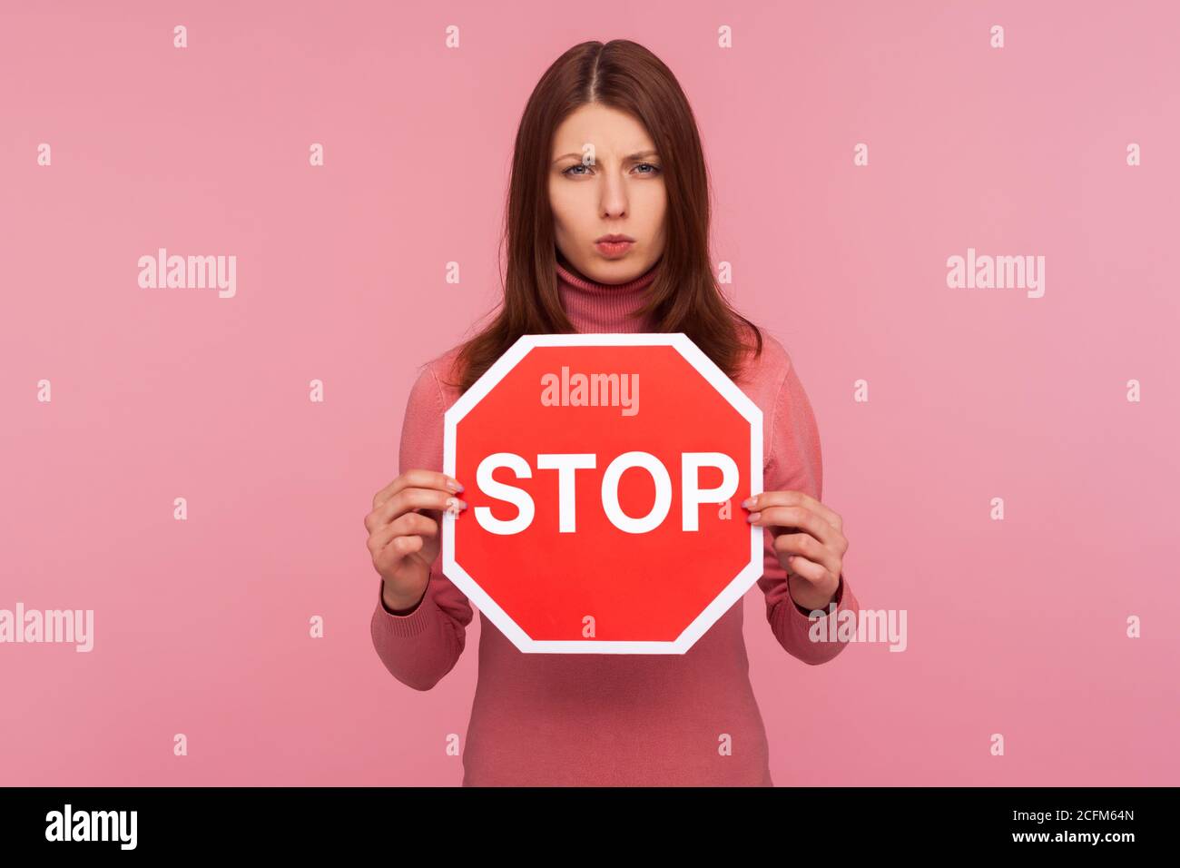 Holding stop sign hi-res stock photography and images - Alamy