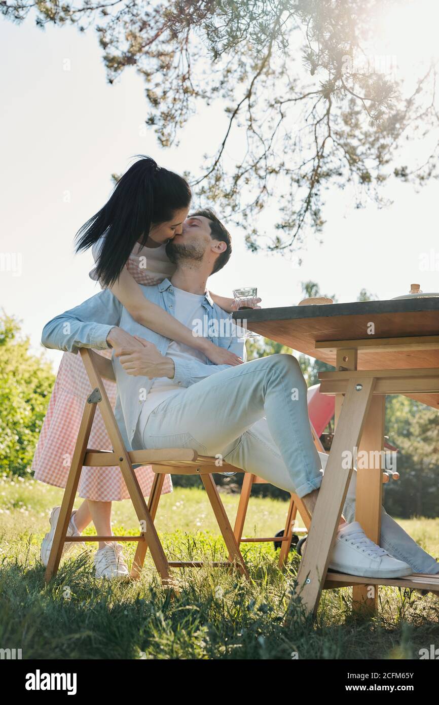 Two men kissing woman hi-res stock photography and images - Alamy
