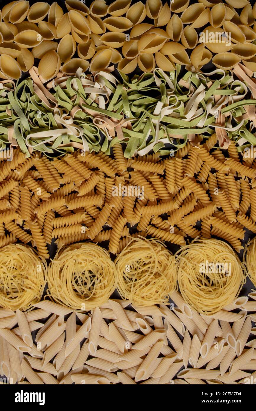Variety of types and shapes of dry Italian pasta. Italian Macaroni raw ...