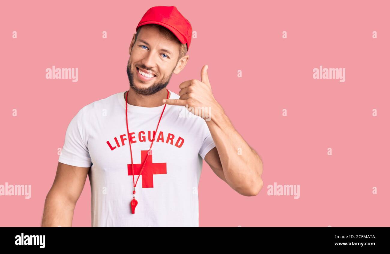 Lifeguard talking hi-res stock photography and images - Alamy