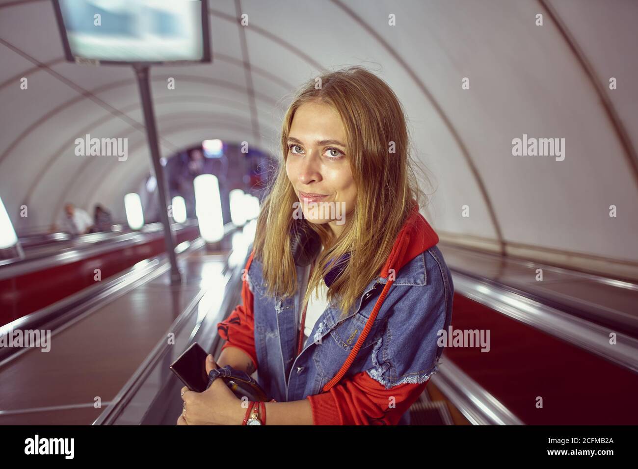 Beautiful woman in the subway hi-res stock photography and images - Alamy