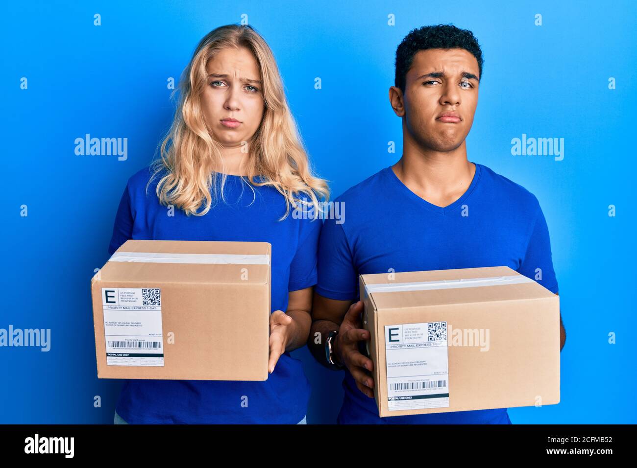 Couple unsure holding hands hi-res stock photography and images - Alamy