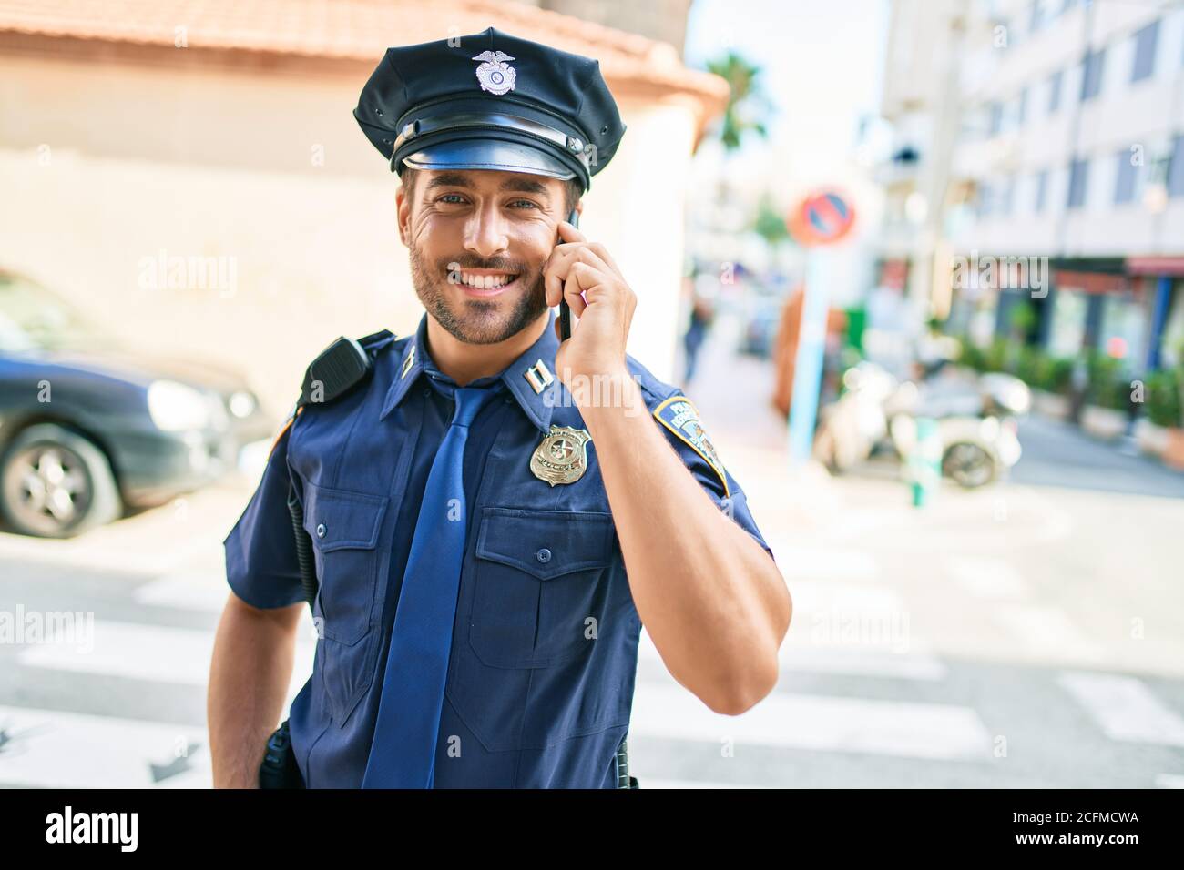 Authority communication smiling standing uniform hi-res stock ...