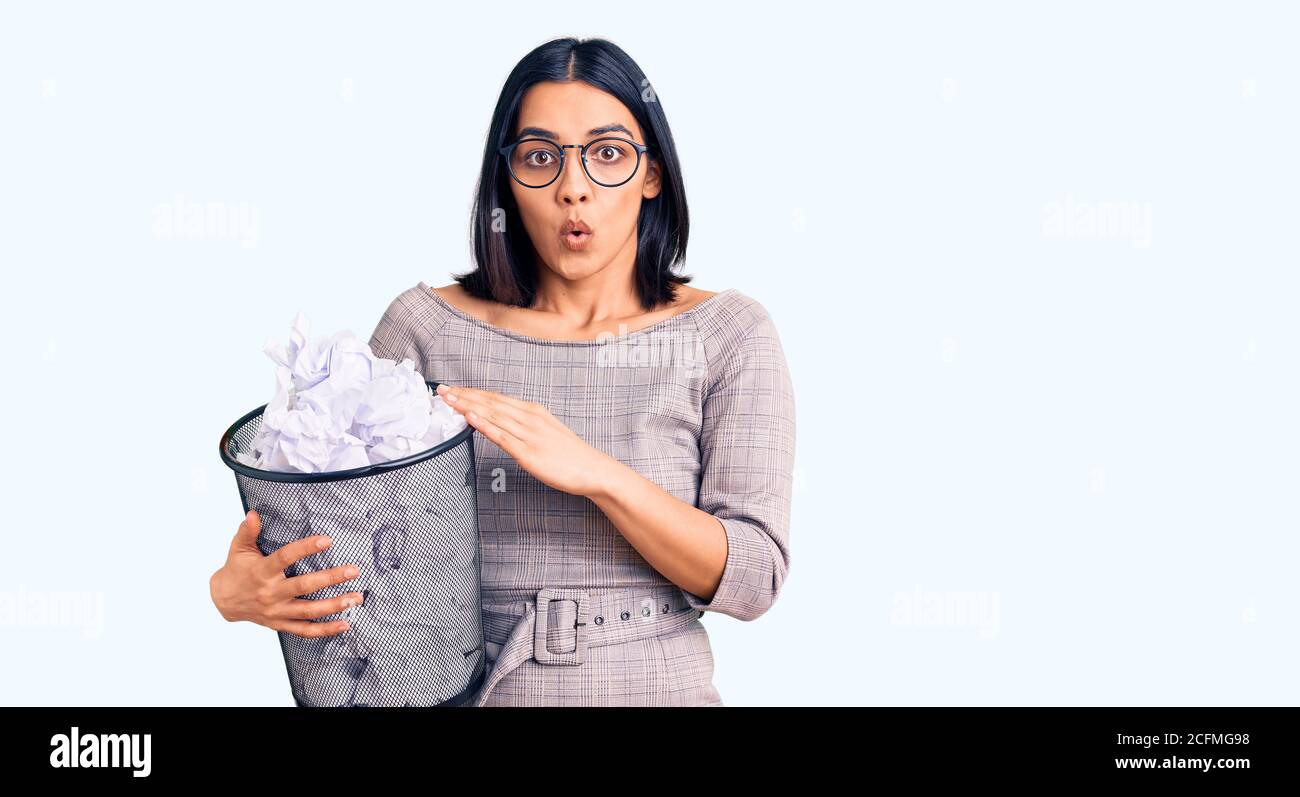 Woman holding papers shocked hi-res stock photography and images - Alamy