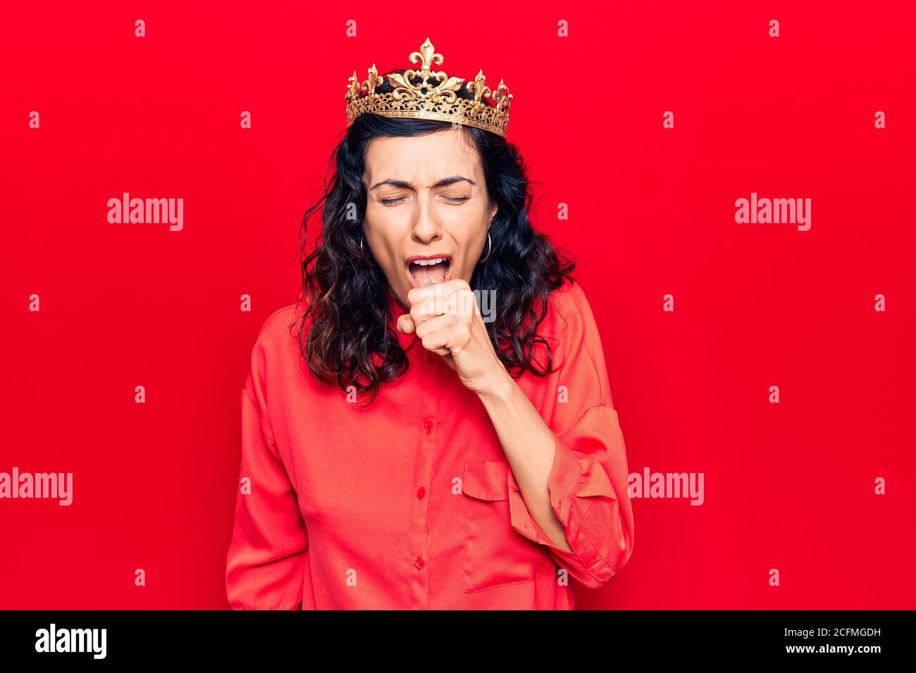 Young beautiful hispanic woman wearing princess crown feeling unwell ...