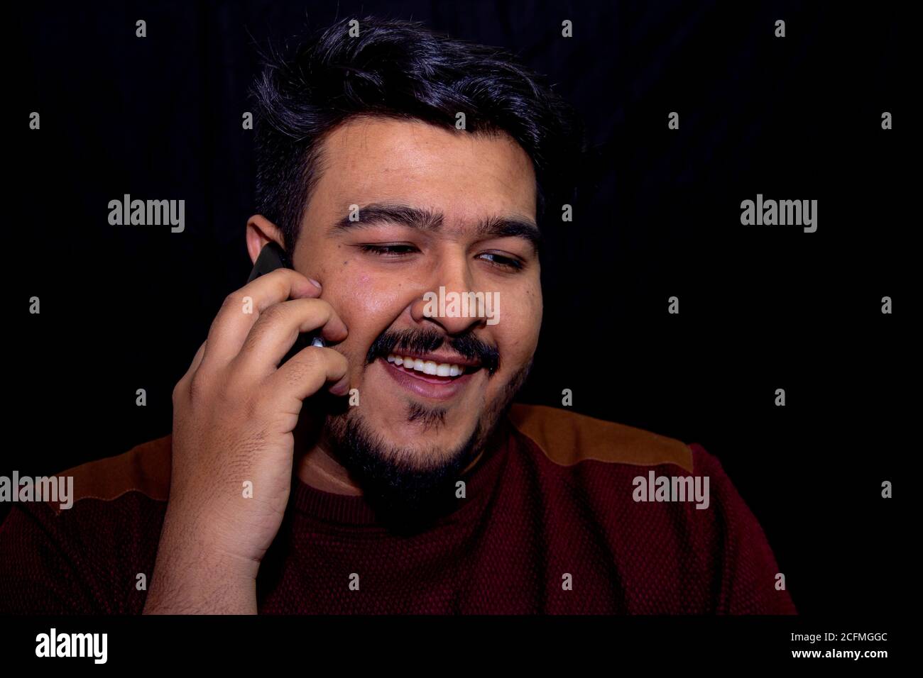 Black teen boy talking on phone hi-res stock photography and images - Alamy