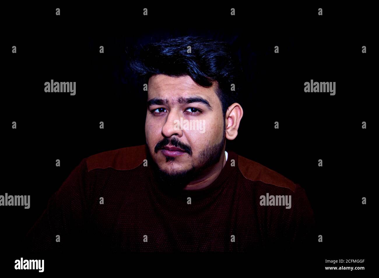 An upset young boy thinking deep Stock Photo - Alamy