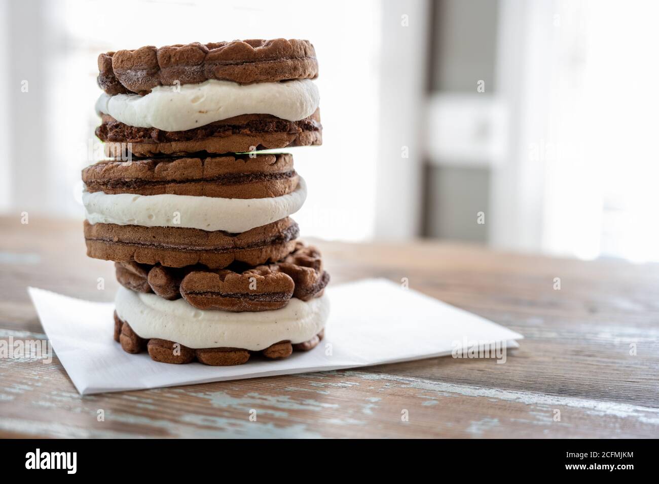 Low Angle of Ice Cream Sandwich Stack on parchment paper Stock Photo ...