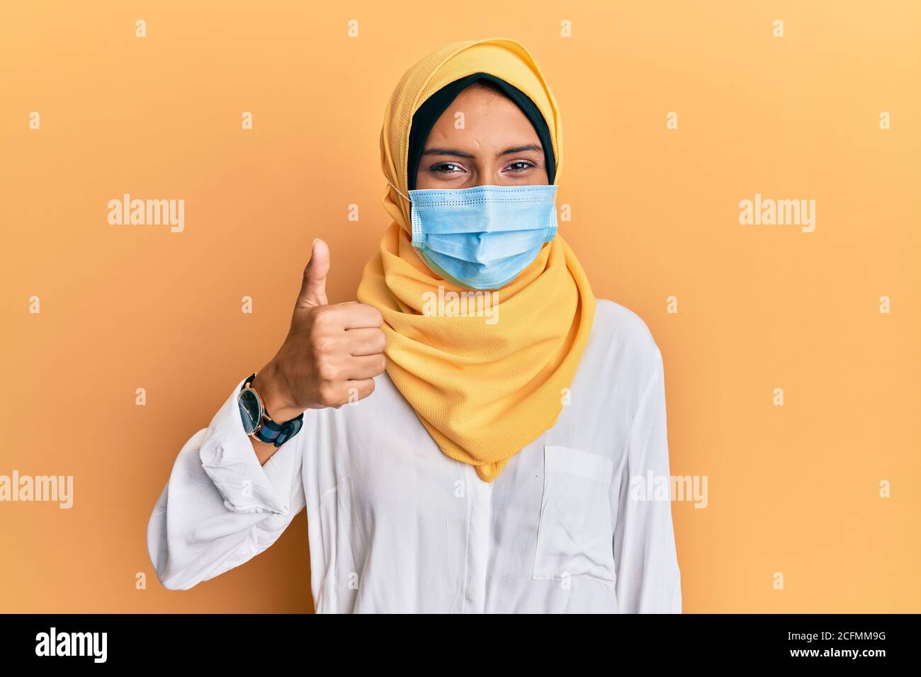 Young brunette arab woman wearing traditional islamic hijab and medical ...