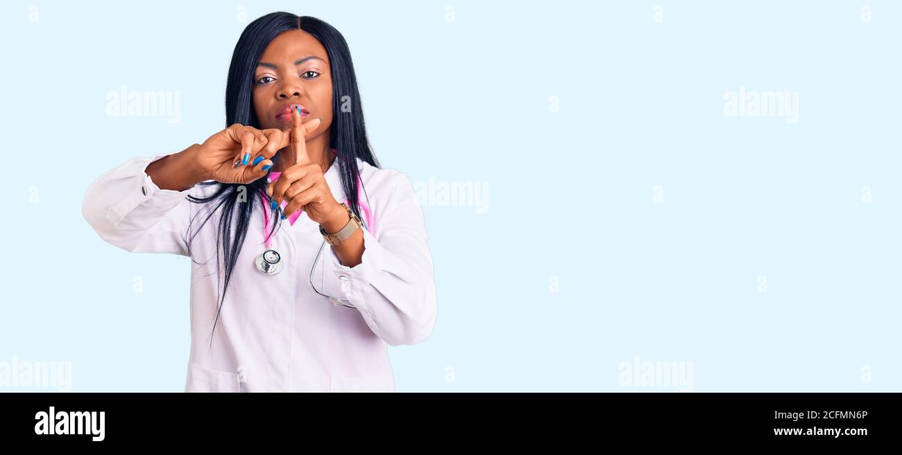 Young african american woman wearing doctor stethoscope rejection ...