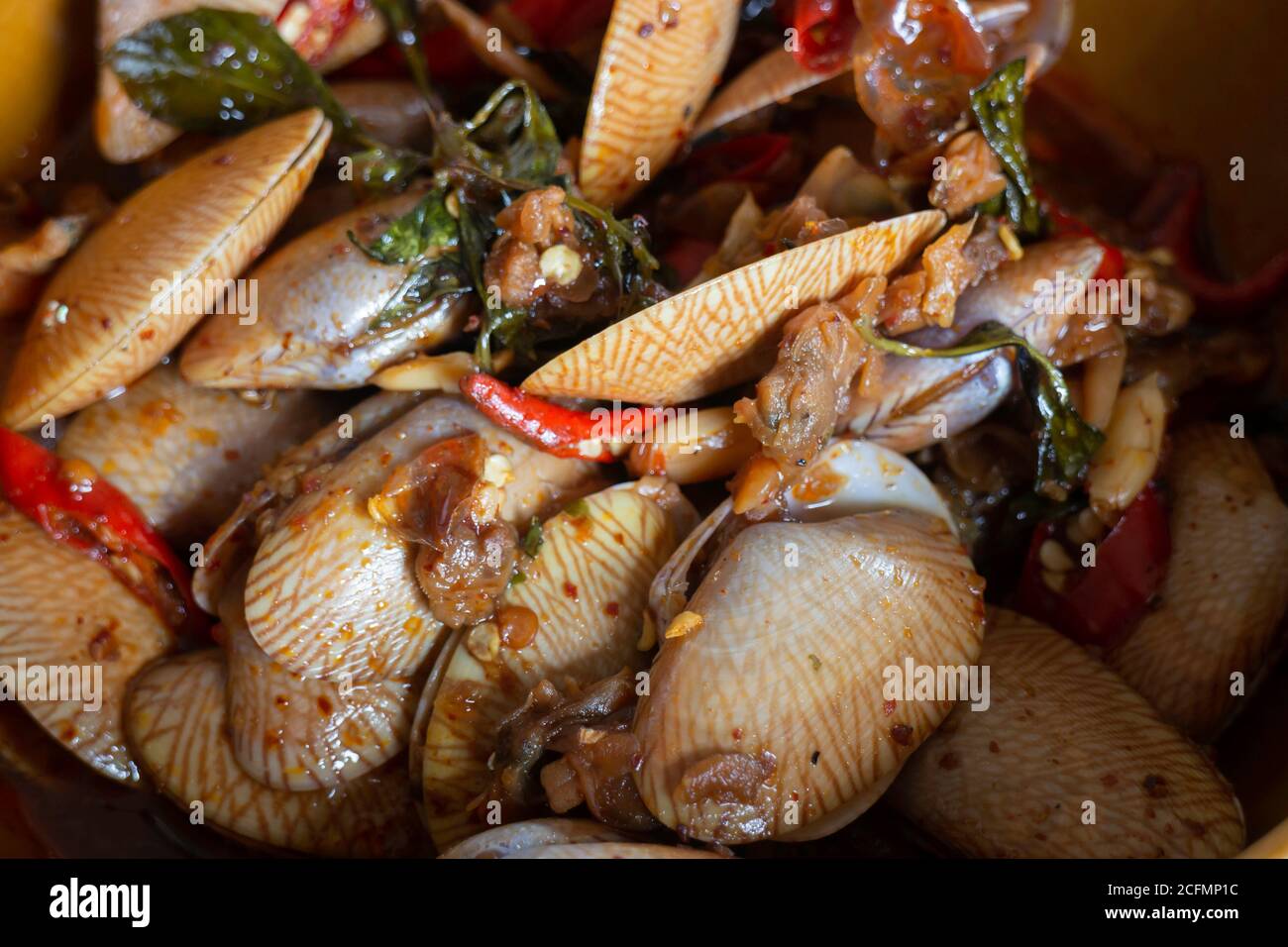 Stir fried clams with thai sweet basil,stock photo Stock Photo - Alamy
