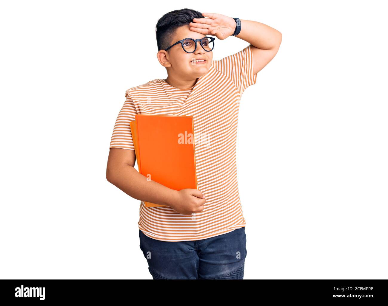 Little boy kid holding book wearing glasses very happy and smiling ...