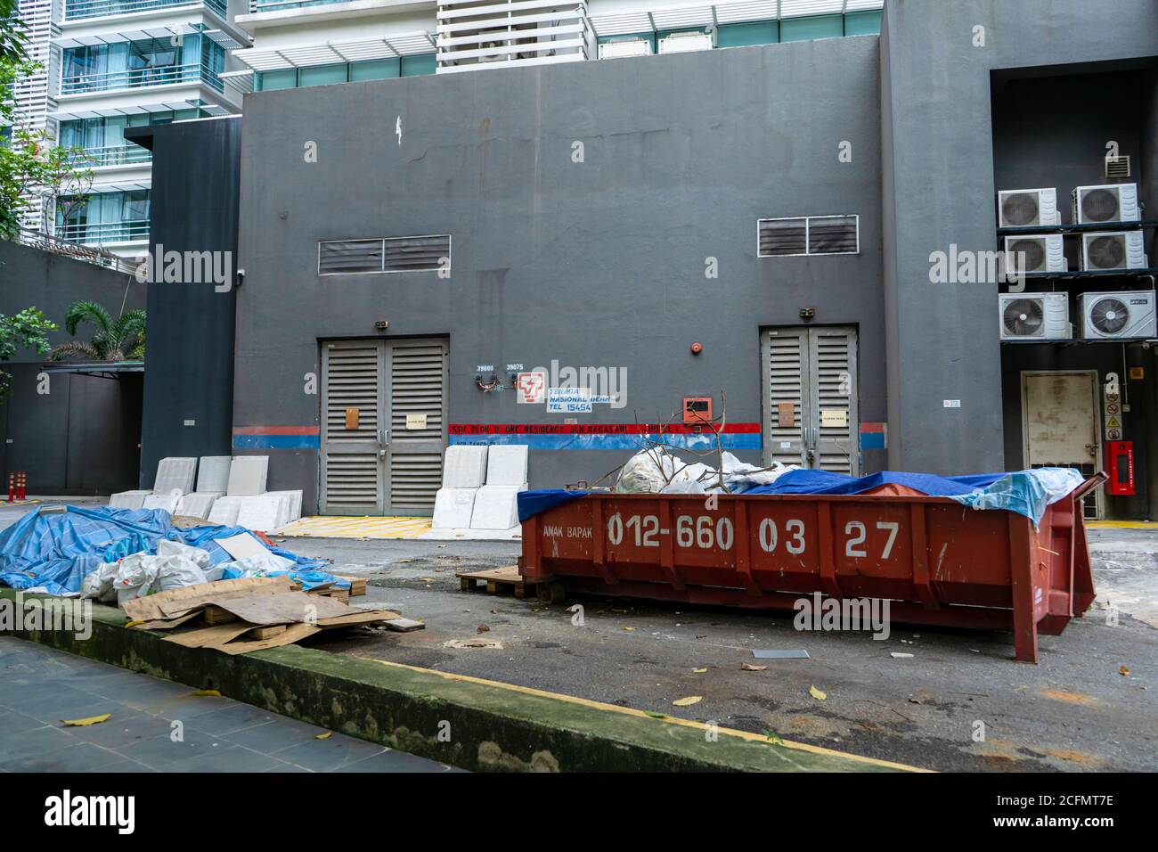 Garbage containers on a city street. Waste containers. Street ...