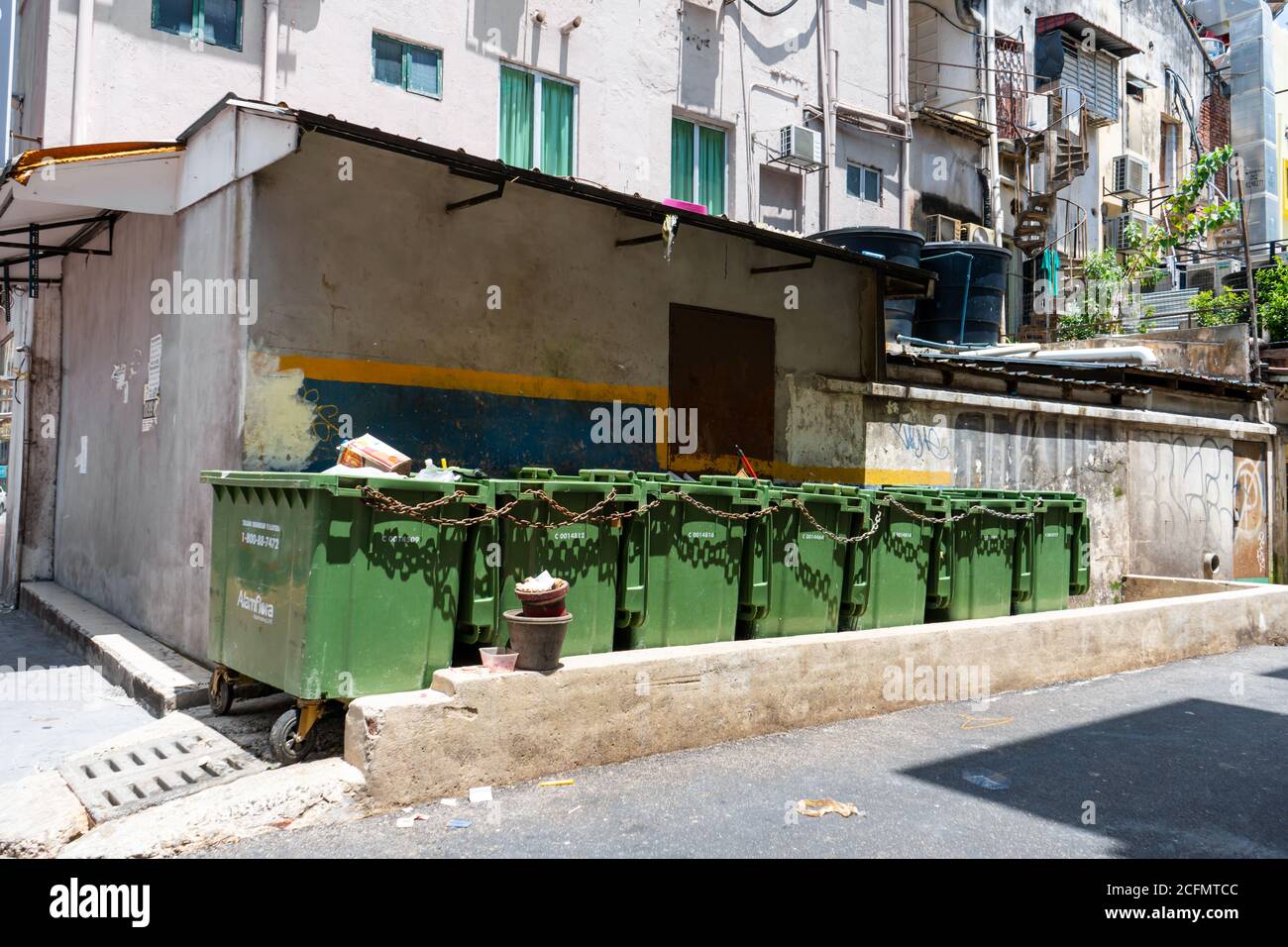 Garbage containers on a city street. Waste containers. Street ...