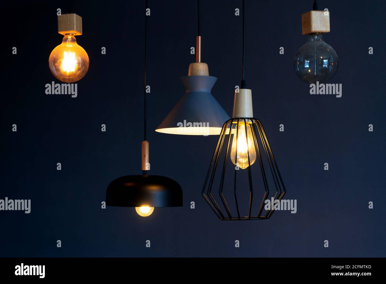 Interior decoration of stylish housing. Loft style incandescent lamp ...
