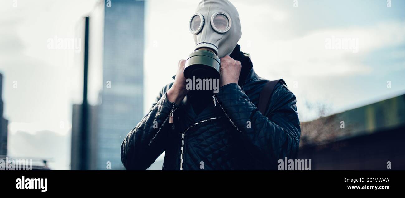 Young man wearing gas mask hi-res stock photography and images - Alamy