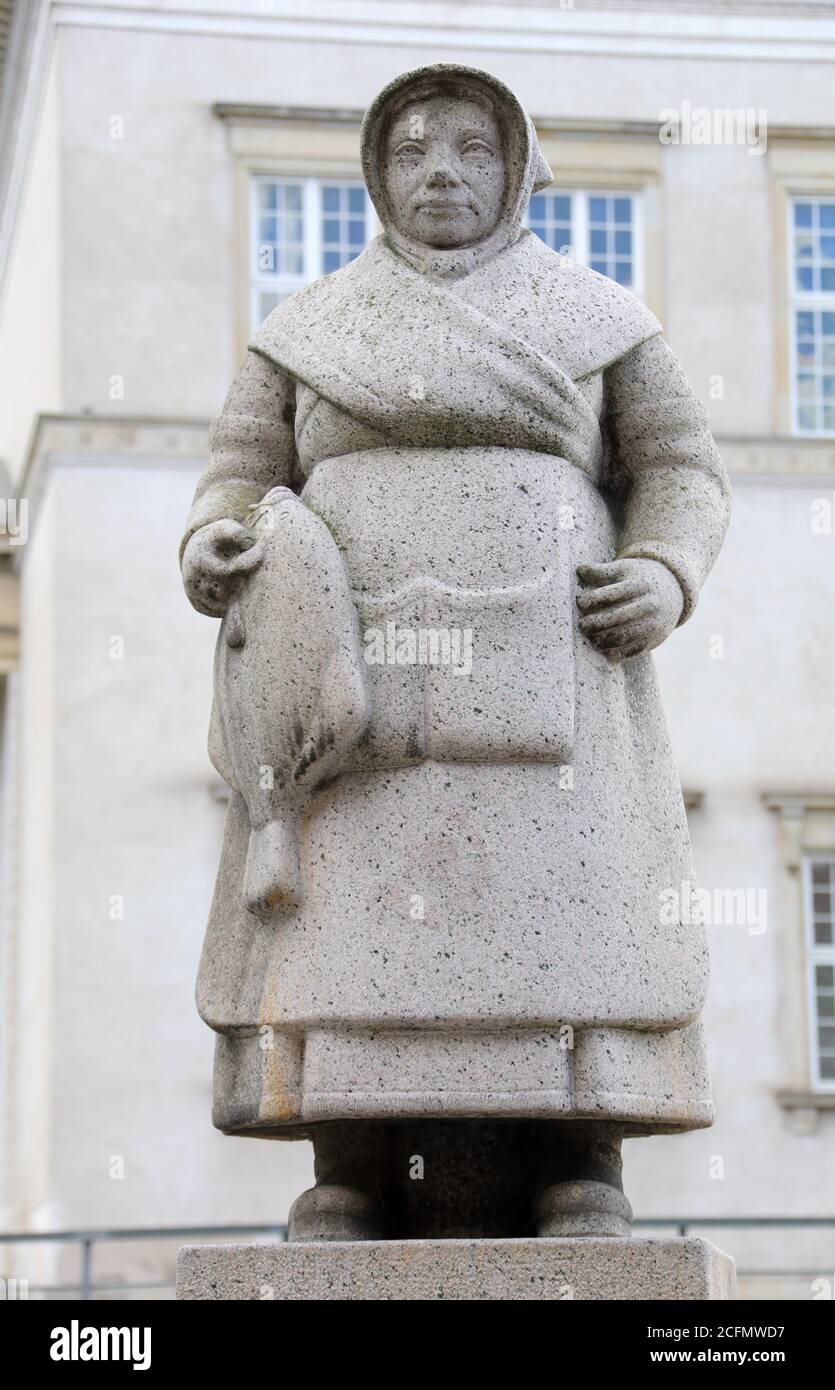 Statue of a fishwife on the site of an old fish market in Copenhagen ...
