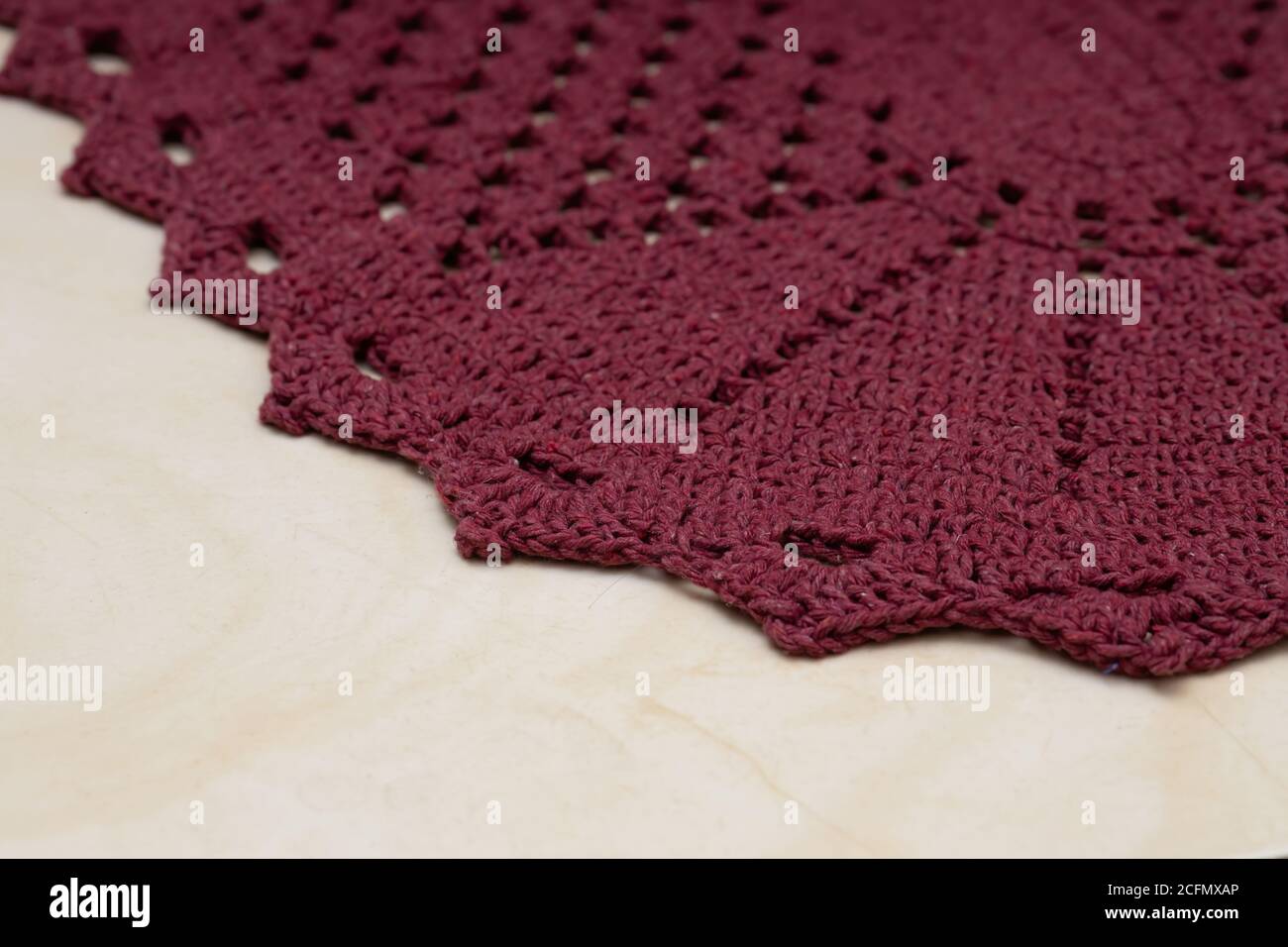 Red crochet rug handmade in close up Stock Photo - Alamy