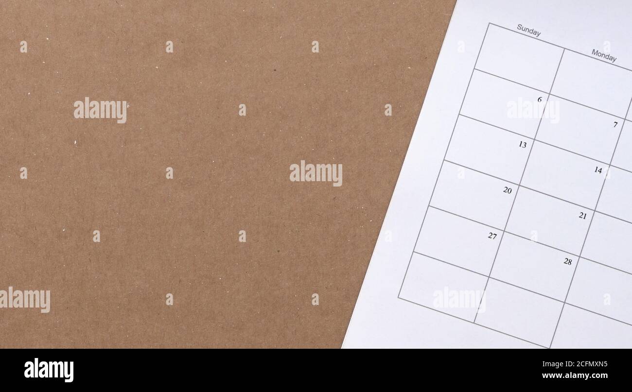 Calendar on brown cardboard paper, copy space. Business meeting ...
