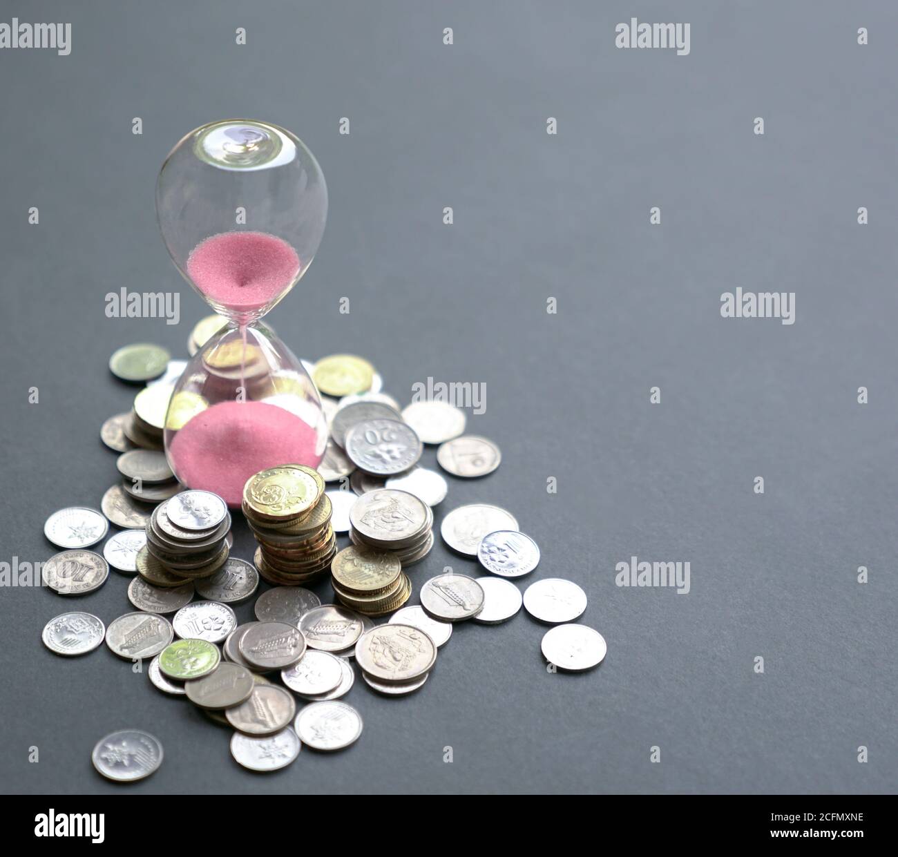 Money sand timer hi-res stock photography and images - Alamy
