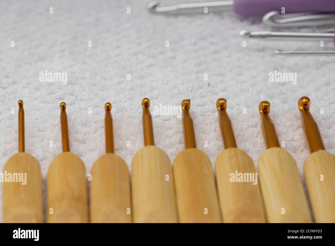 Crochet needles in close up Stock Photo - Alamy