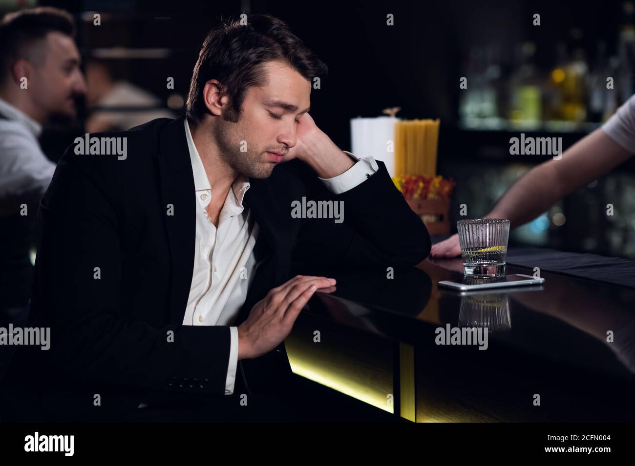 Man asleep at bar hi-res stock photography and images - Alamy