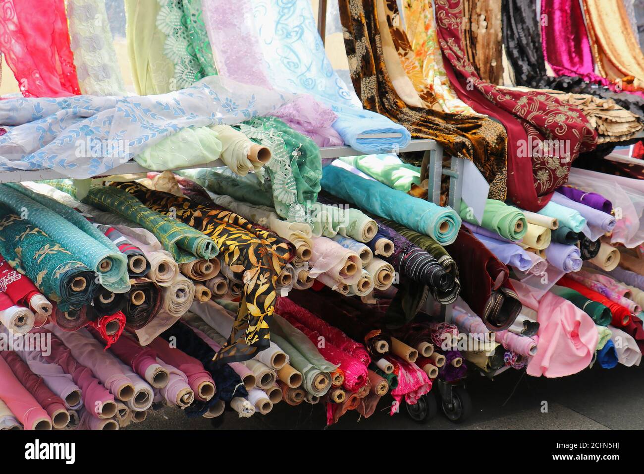 Colorful materials sold on street market for fashion industry Stock ...