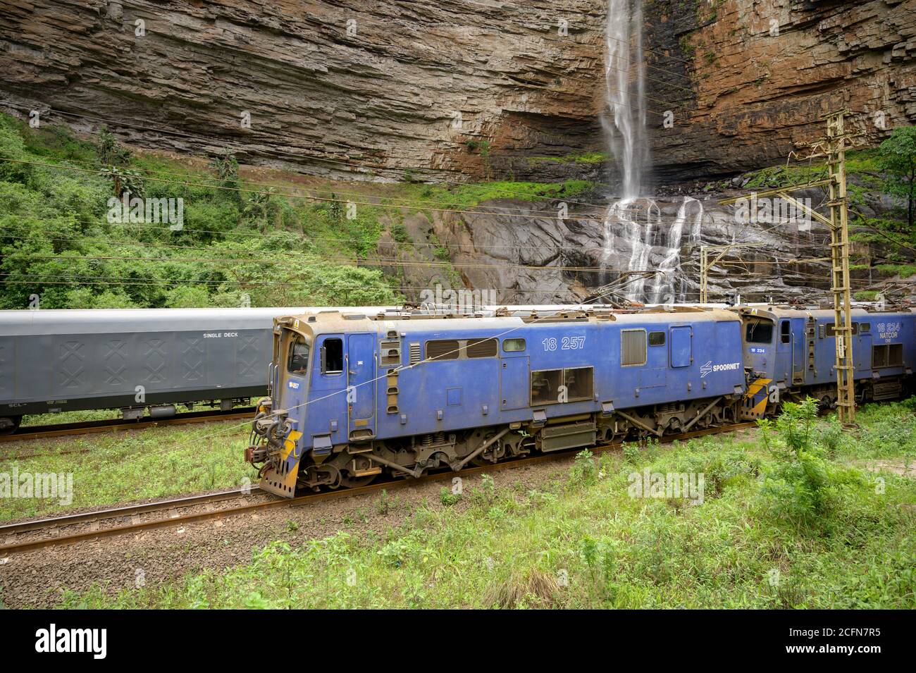 The Shongweni Waterfall with South African Transnet railway train. Kwa ...
