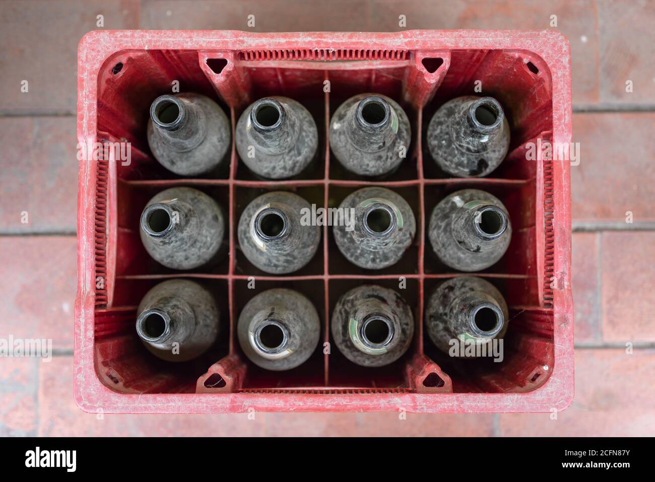 Top view of a red box full of empty beer bottles. Dusty bottles Stock ...