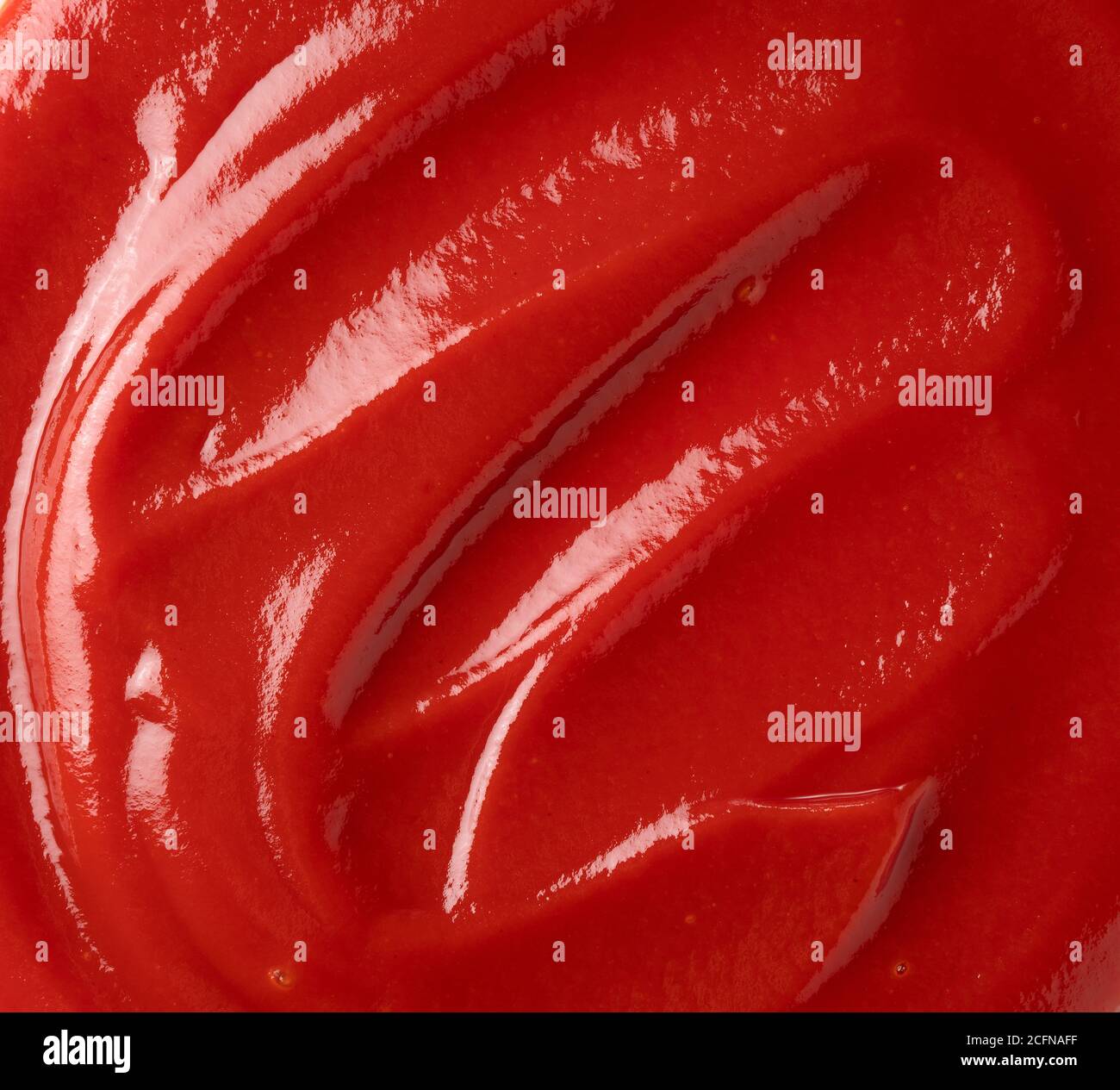 Wave pattern of ketchup shot on the entire screen Stock Photo - Alamy