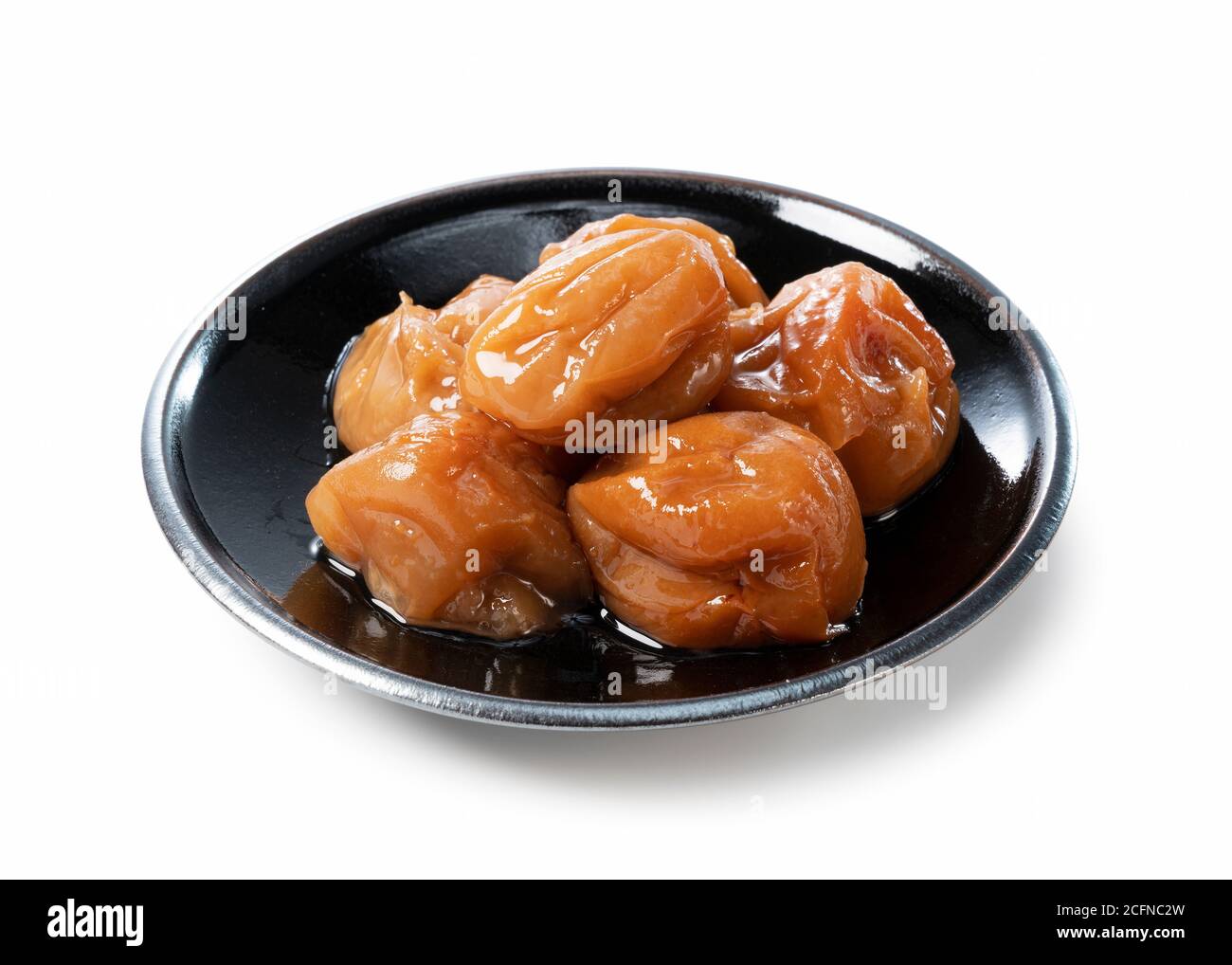 Japanese pickled plums on a white background. (Kishu Nanko Ume Stock ...