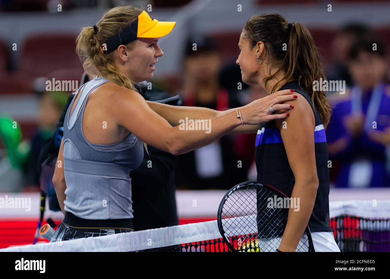 Caroline Wozniacki of Denmark & Daria Kasatkina of Russia at the net ...