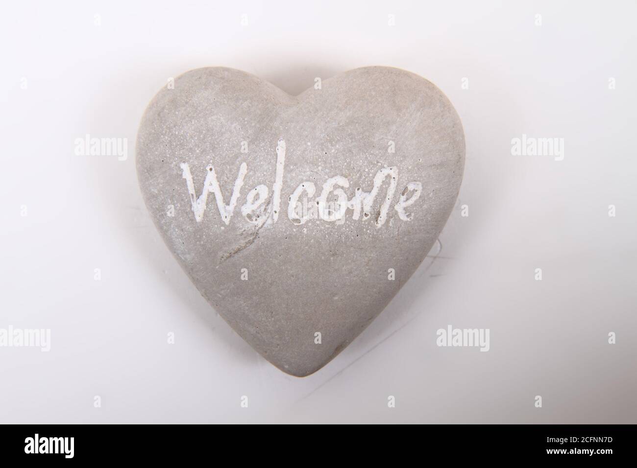 Welcome message wooden heart sign hi-res stock photography and images ...