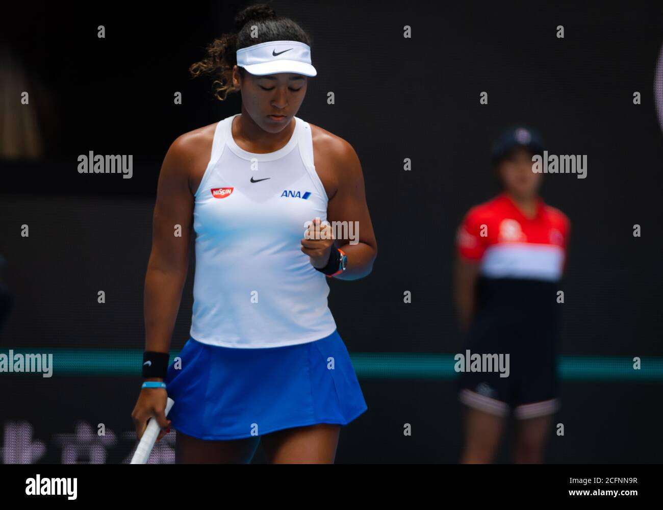 Naomi Osaka of Japan in action during her first-round match at the 2019 ...