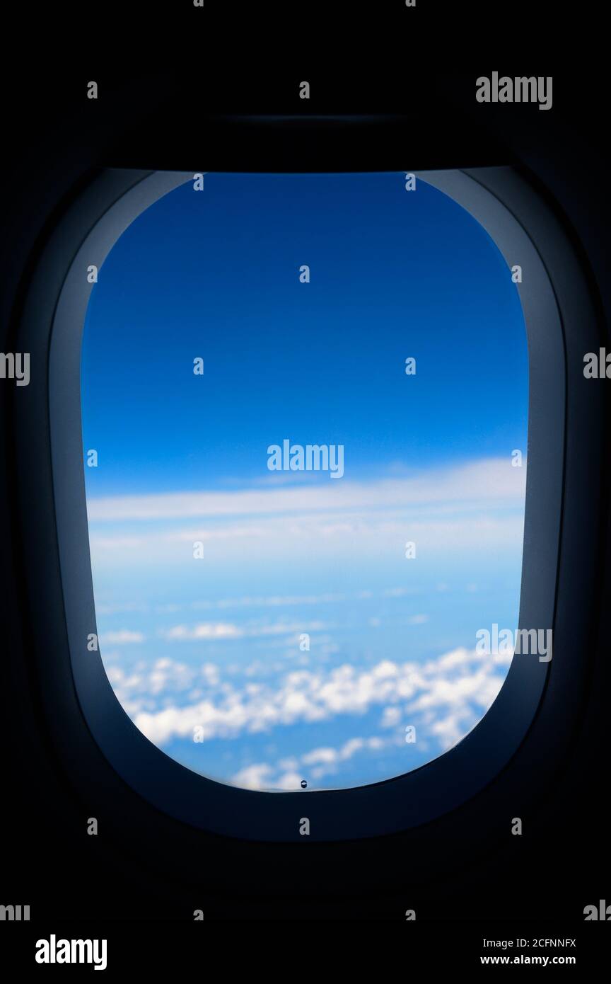 Window view from passenger seat on commercial airplane Stock Photo - Alamy