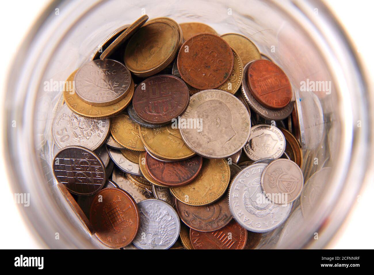 Silver coin in glass hi-res stock photography and images - Alamy