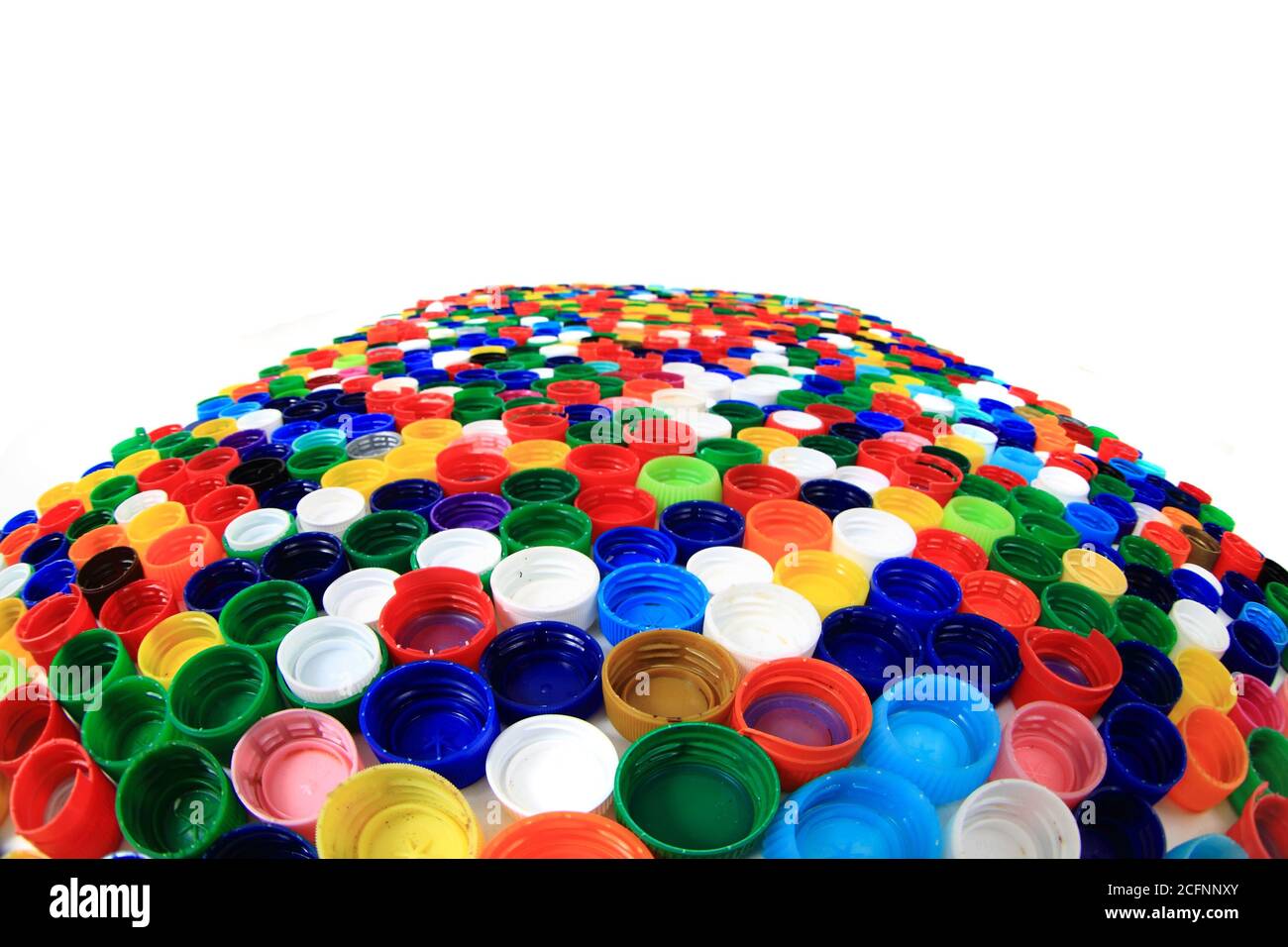color plastic caps isolated on the white background Stock Photo - Alamy