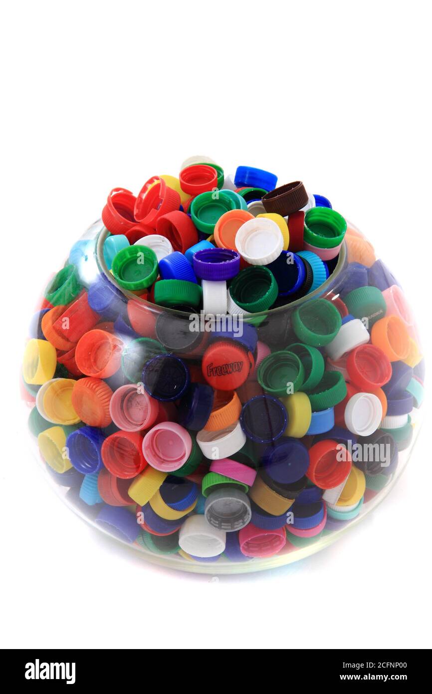 color plastic caps isolated on the white background Stock Photo - Alamy