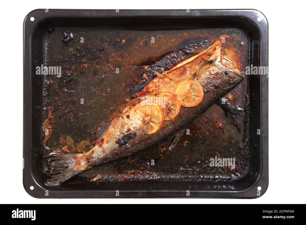 baked salmon fish isolated on the white background Stock Photo - Alamy